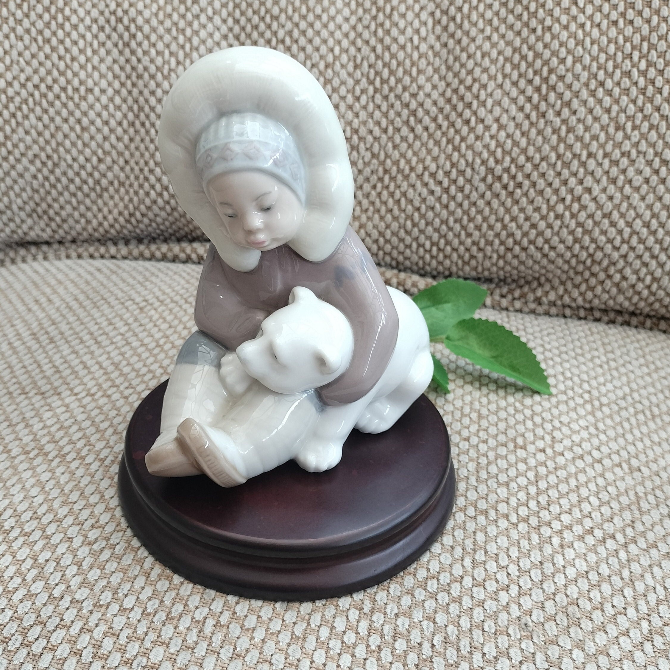 Lladro eskimo boy with polar bear store
