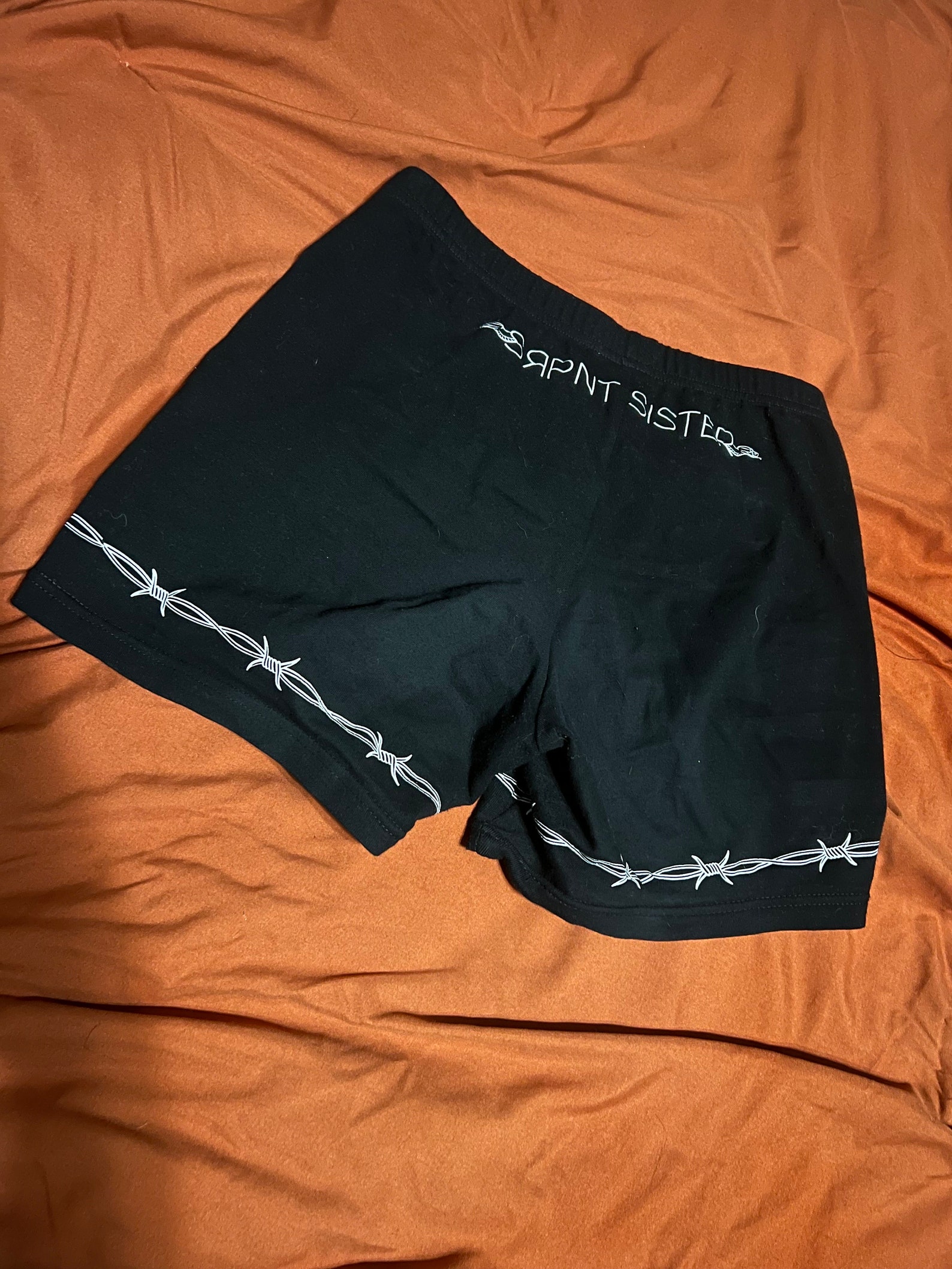 Edgy Chic: Barbed Wire or Flame Embellished Biker Shorts | Emo Biker ...