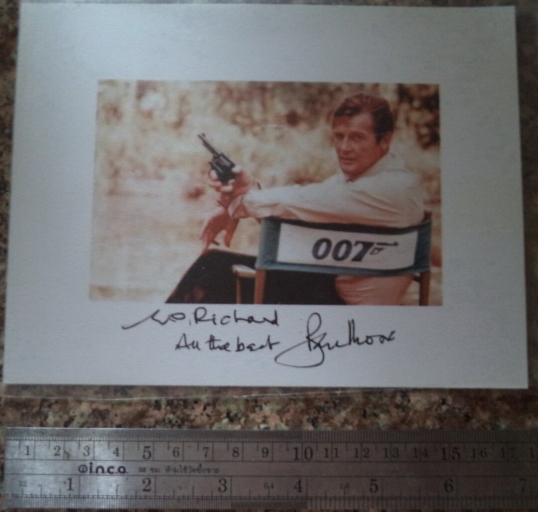 ROGER MOORE 1927 2017 Autograph, Hand Signed on Set Photo live and Let ...