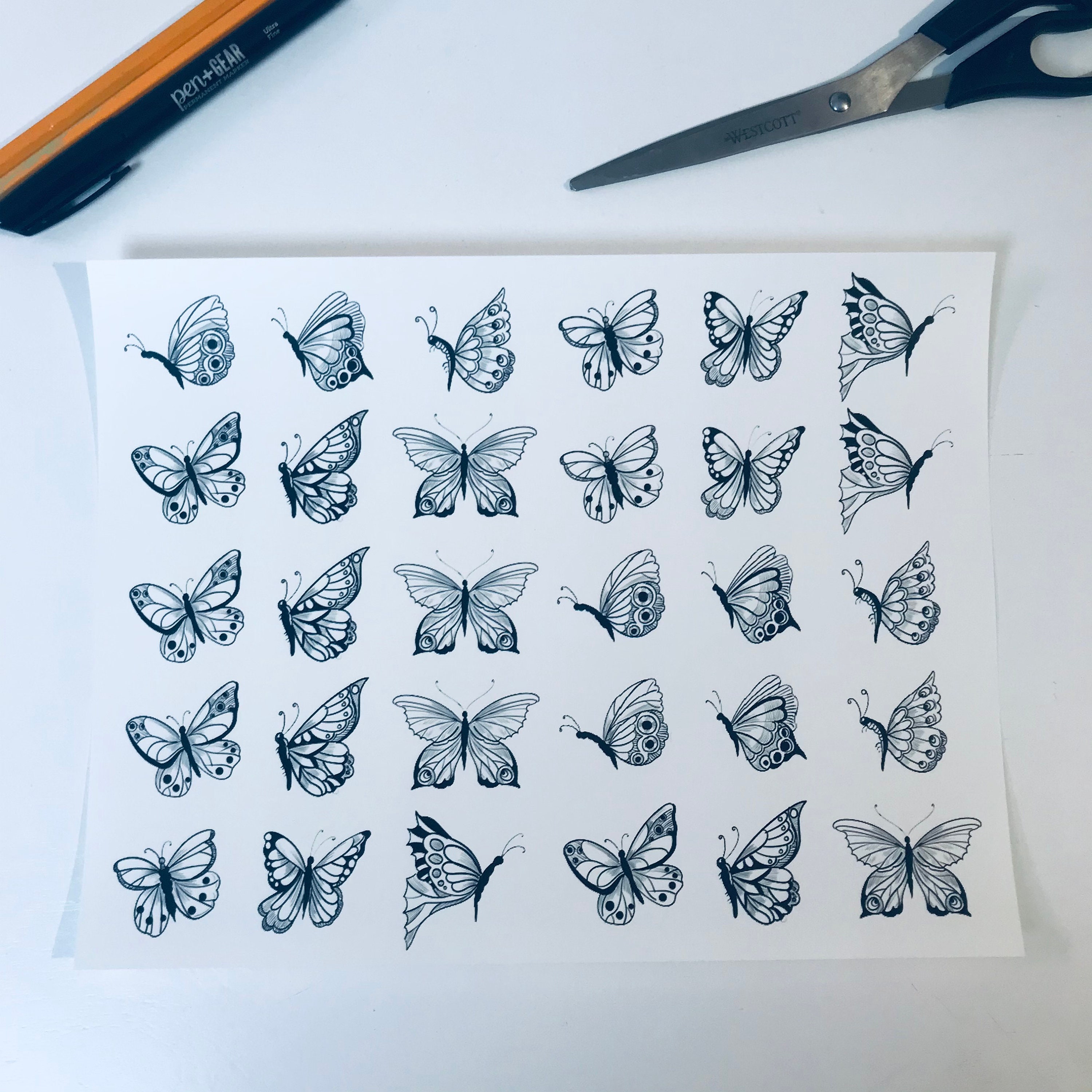 White Ink Butterfly Tattoo