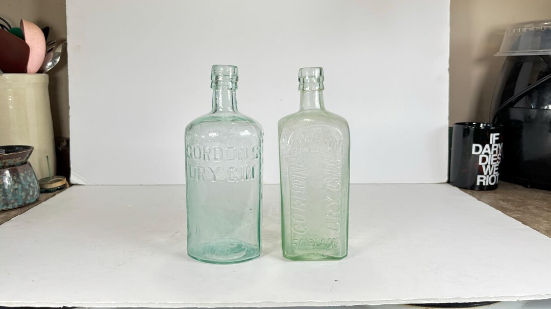 SET OF 2 Antique Alcohol Bottles. Aqua Gordons Dry Gin. Embossed ...