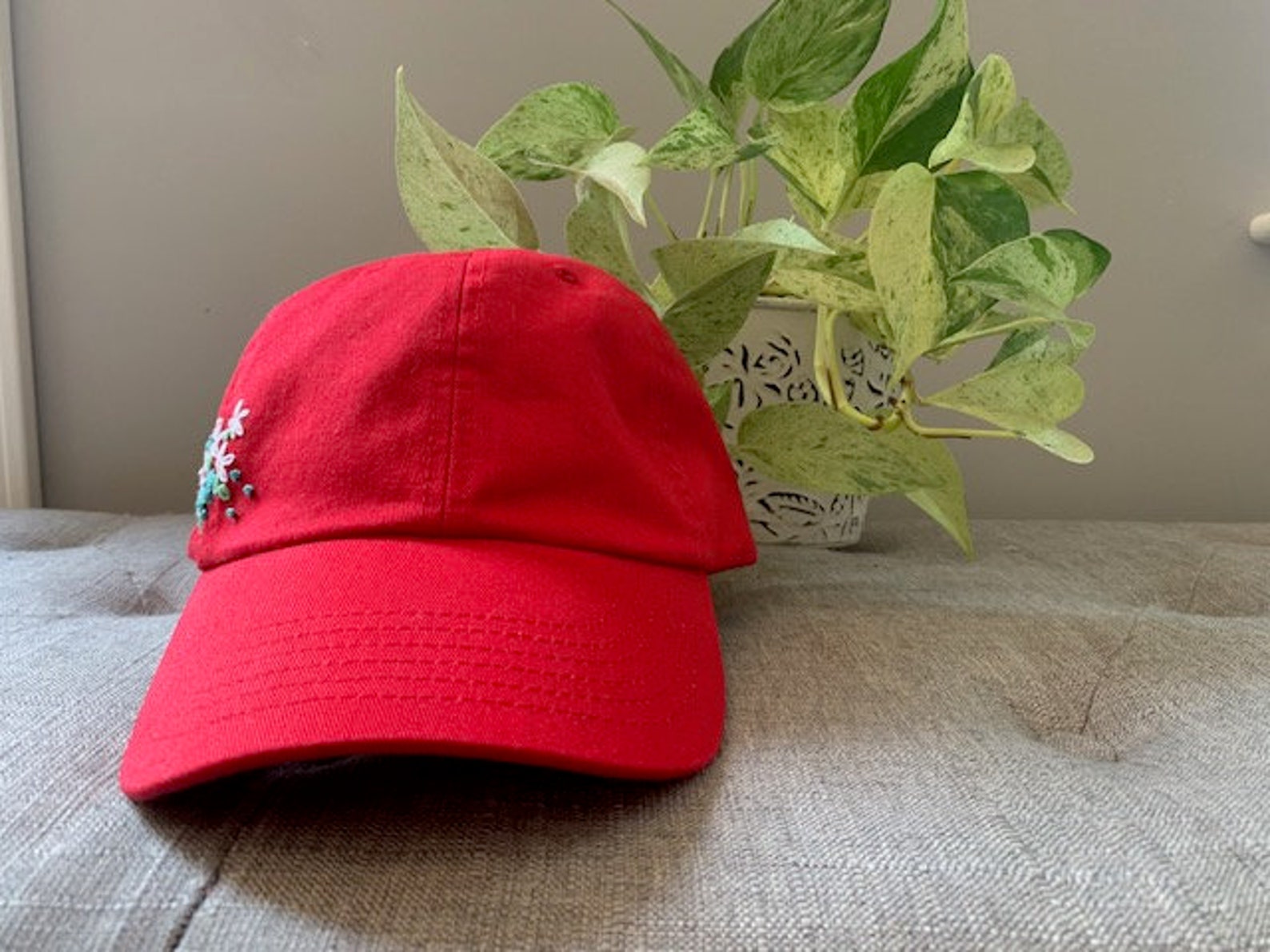 True Red Cap With White and Blue Flowers, Blue and White Flowers on Red ...