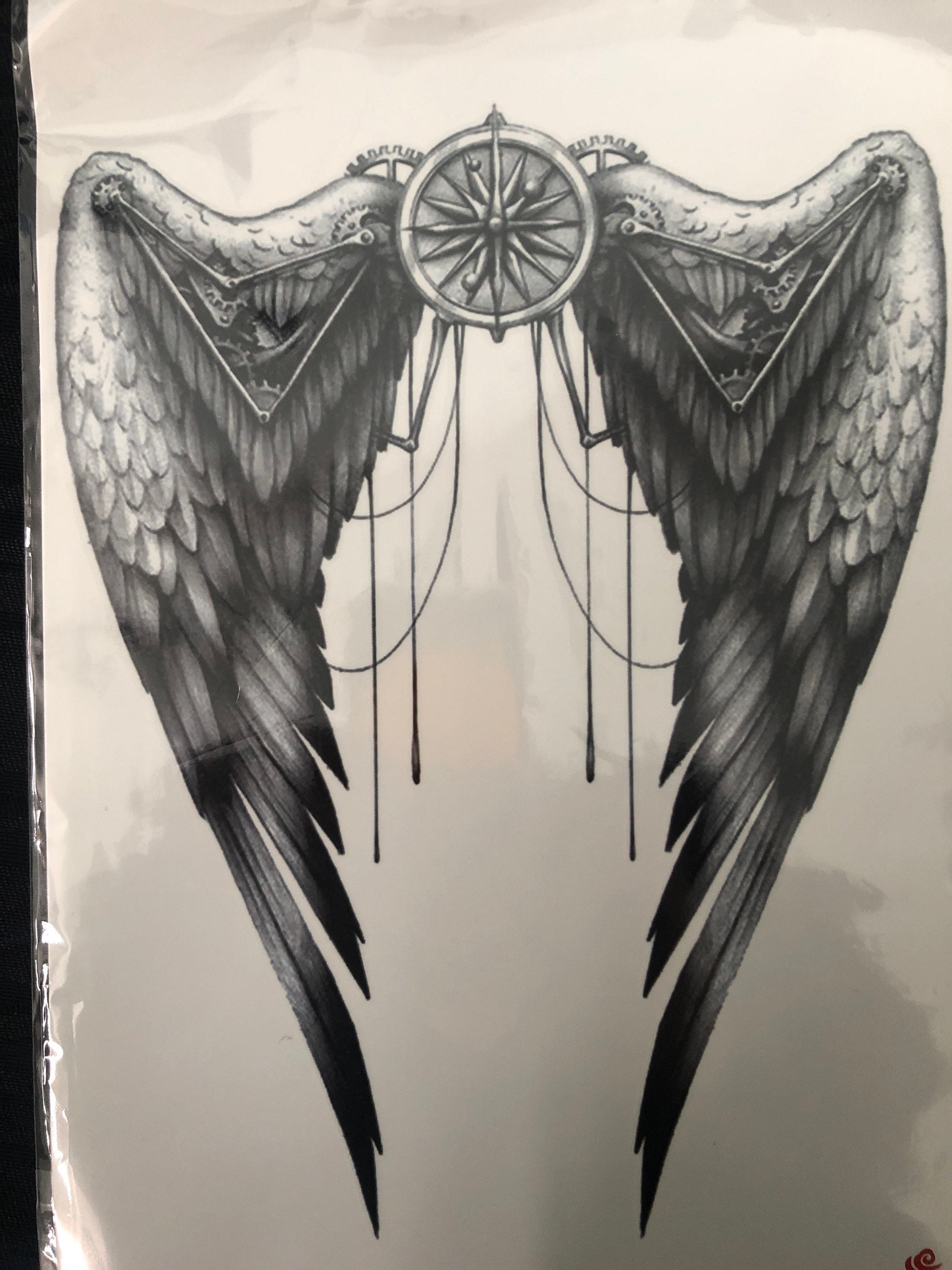 Realistic Angel Wings Tattoo