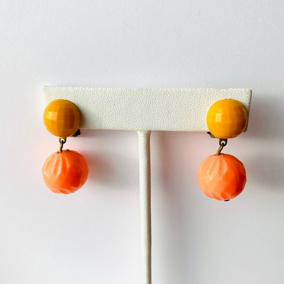 Vintage Orange Yellow Carved Plastic Sphere Dangle Ea… - Gem
