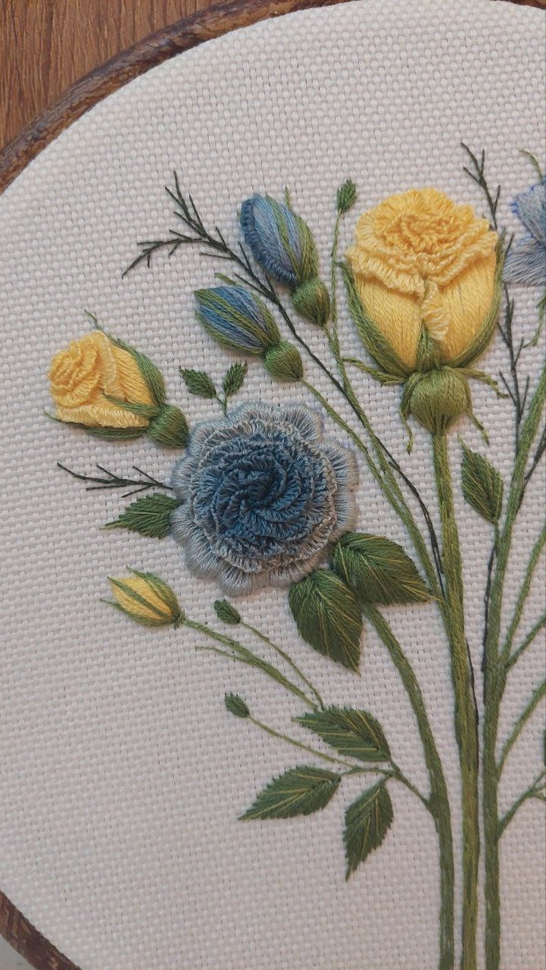 Artistic Floral Harmony Embroidery | Yellow, Blue & Rose Buds ...