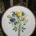 Artistic Floral Harmony Embroidery | Yellow, Blue & Rose Buds ...