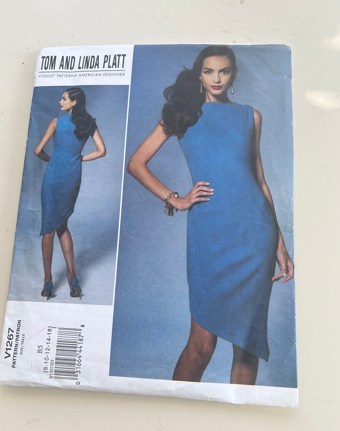 Stunning, Close, Fitting Line Dress With Decorative Shoulders and Side ...
