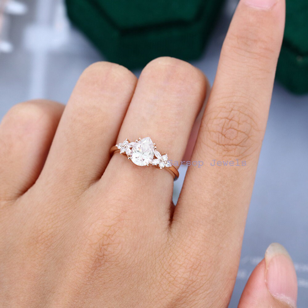 Pear Cut Moissanite Blossom Engagement Ring With Double Claws in Rose ...