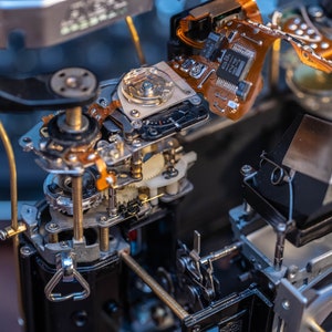 Disassembled Mechanical Film Camera, Deconstructed Canon AE-1 Canon FT ...