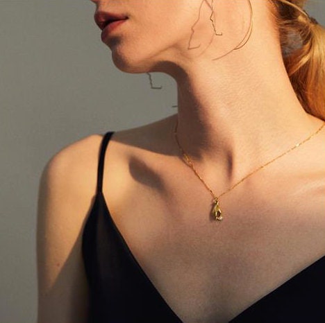 Destiny necklace Small hand holding a zircon diamond set on | Etsy