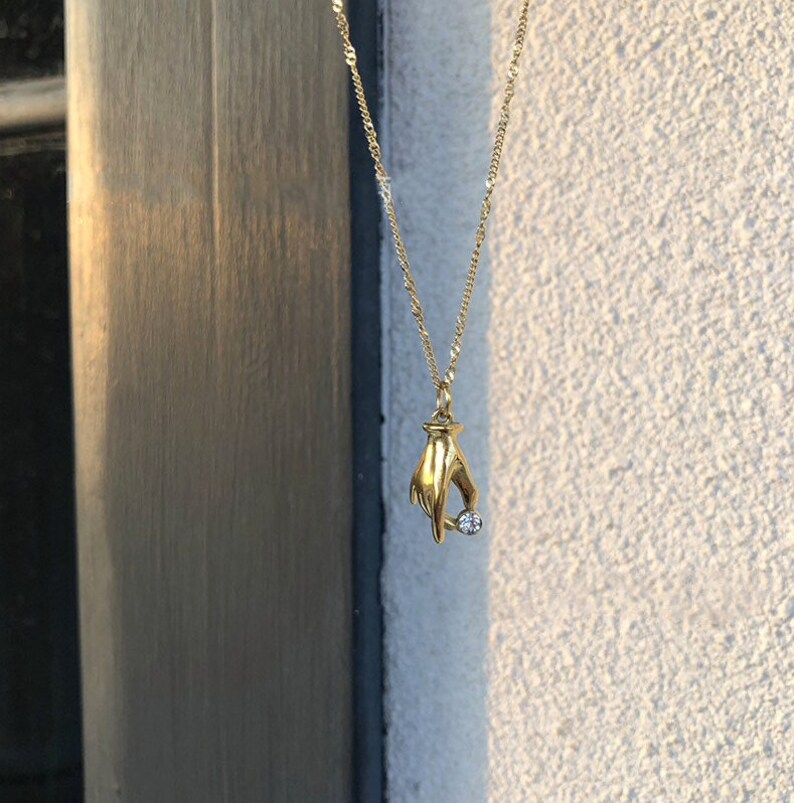 Destiny Necklace Small Hand Holding a Zircon Diamond Set on | Etsy