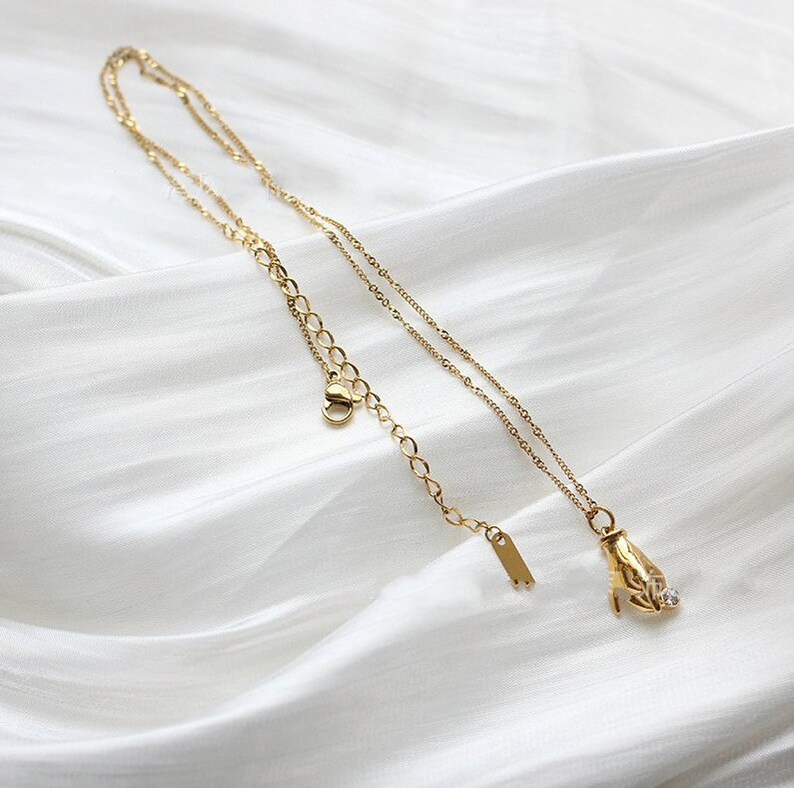 Destiny Necklace Small Hand Holding a Zircon Diamond Set on | Etsy