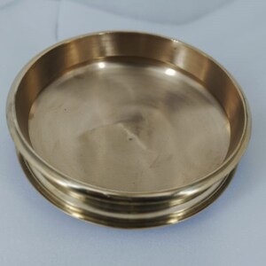 Bronze Traditional Cooking Uruli Polished With Spatula. Urli Bronze ...