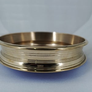 Bronze Traditional Cooking Uruli Polished With Spatula. Urli Bronze ...