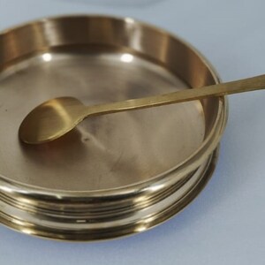 Bronze Traditional Cooking Uruli Polished With Spatula. Urli Bronze ...