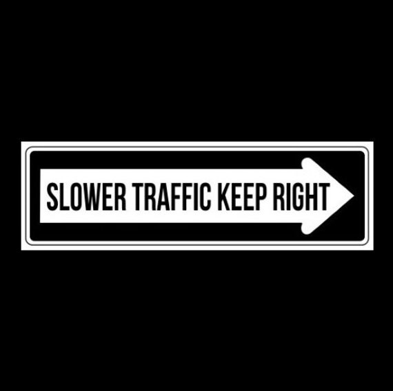 Slower Traffic Keep Right Sign