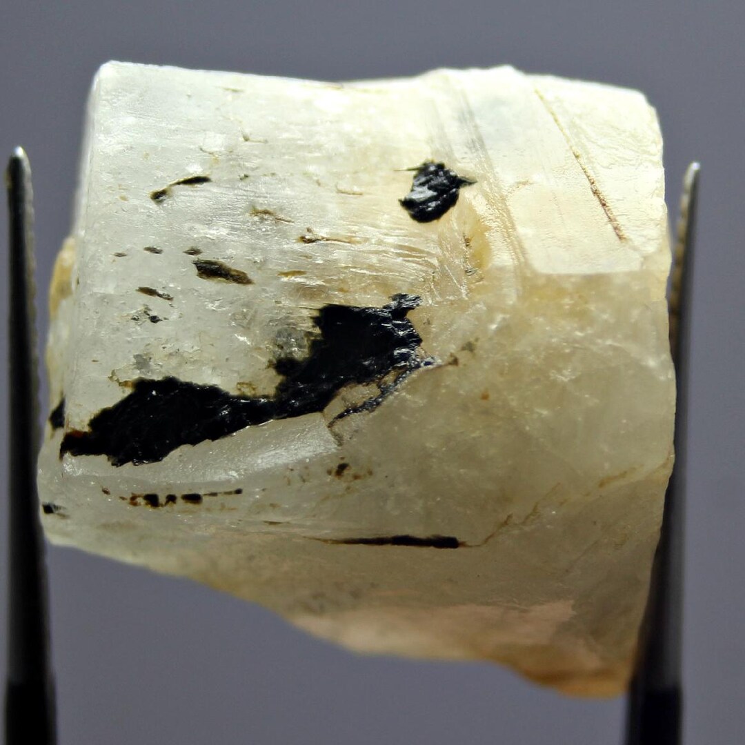 Mesmerizing Raw Goshenite Crystal With Beautiful Garnet Crystal on Top ...