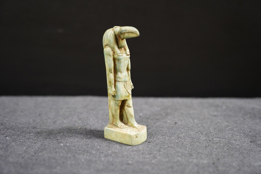 Thoth in Flame Stone: Ancient Egypt's Divine Patron of Wisdom and ...