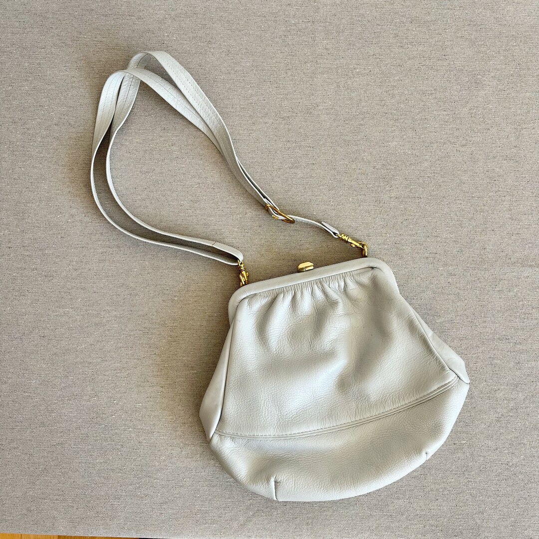 A Small Light Gray Leather Purse With a Gold Clasp Shoulder Women’s Bag ...