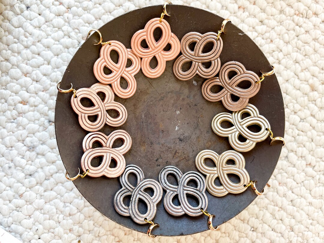 Embossed Infinity Crosses - Etsy