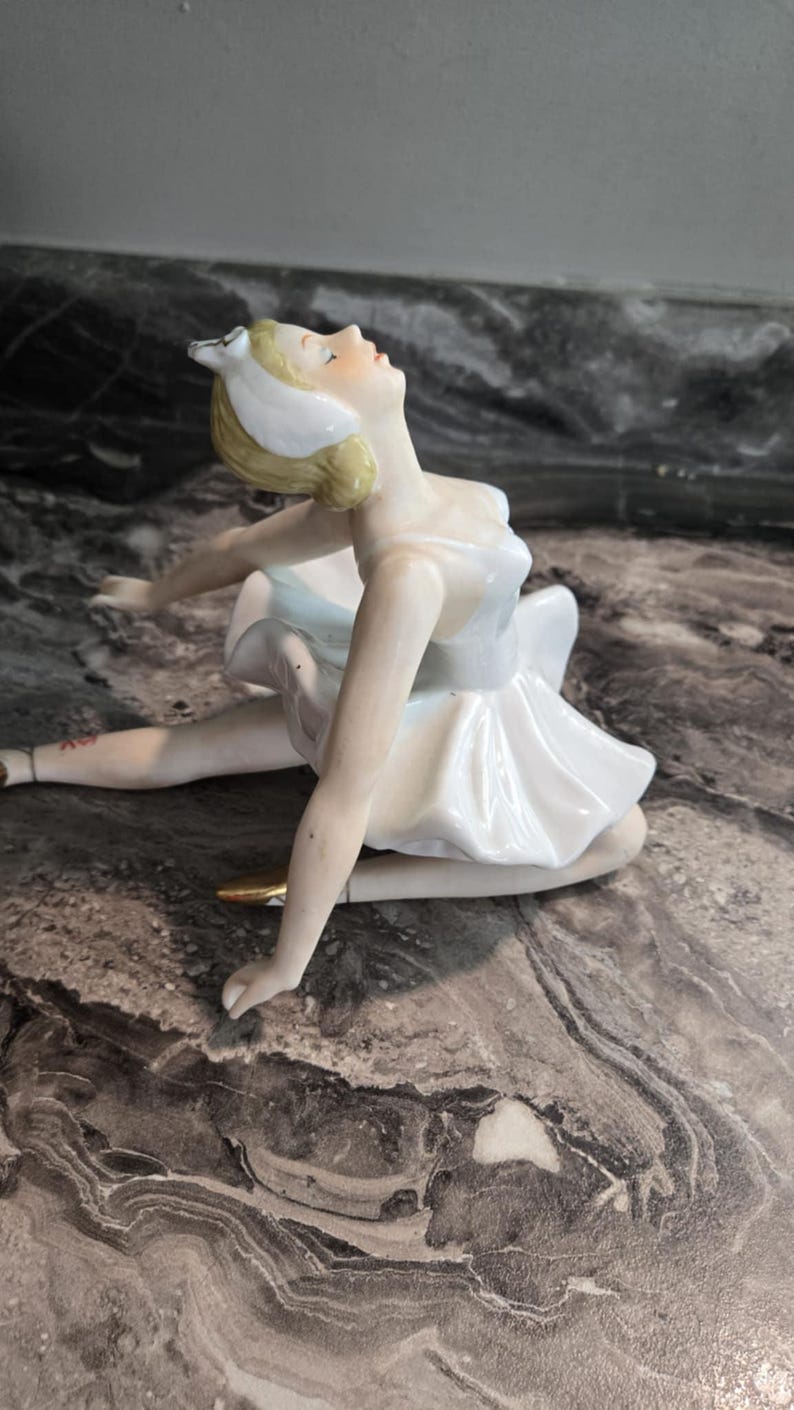 Vintage Porcelain Ballerina Figurine Graceful Seated Dancer In White