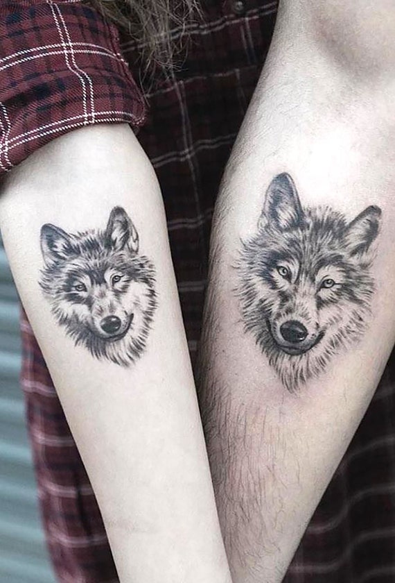 Two Wolves Tattoo