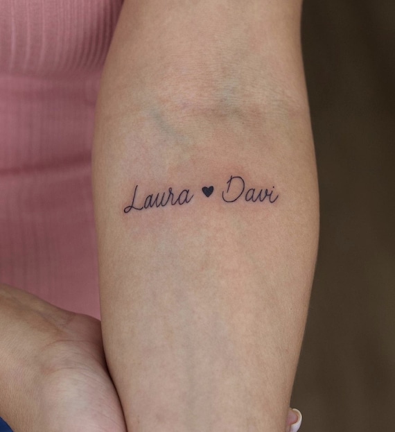 Laura Name Tattoos