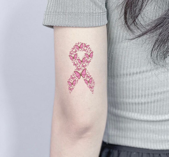 Breast Cancer Ribbon And Cross Tattoo