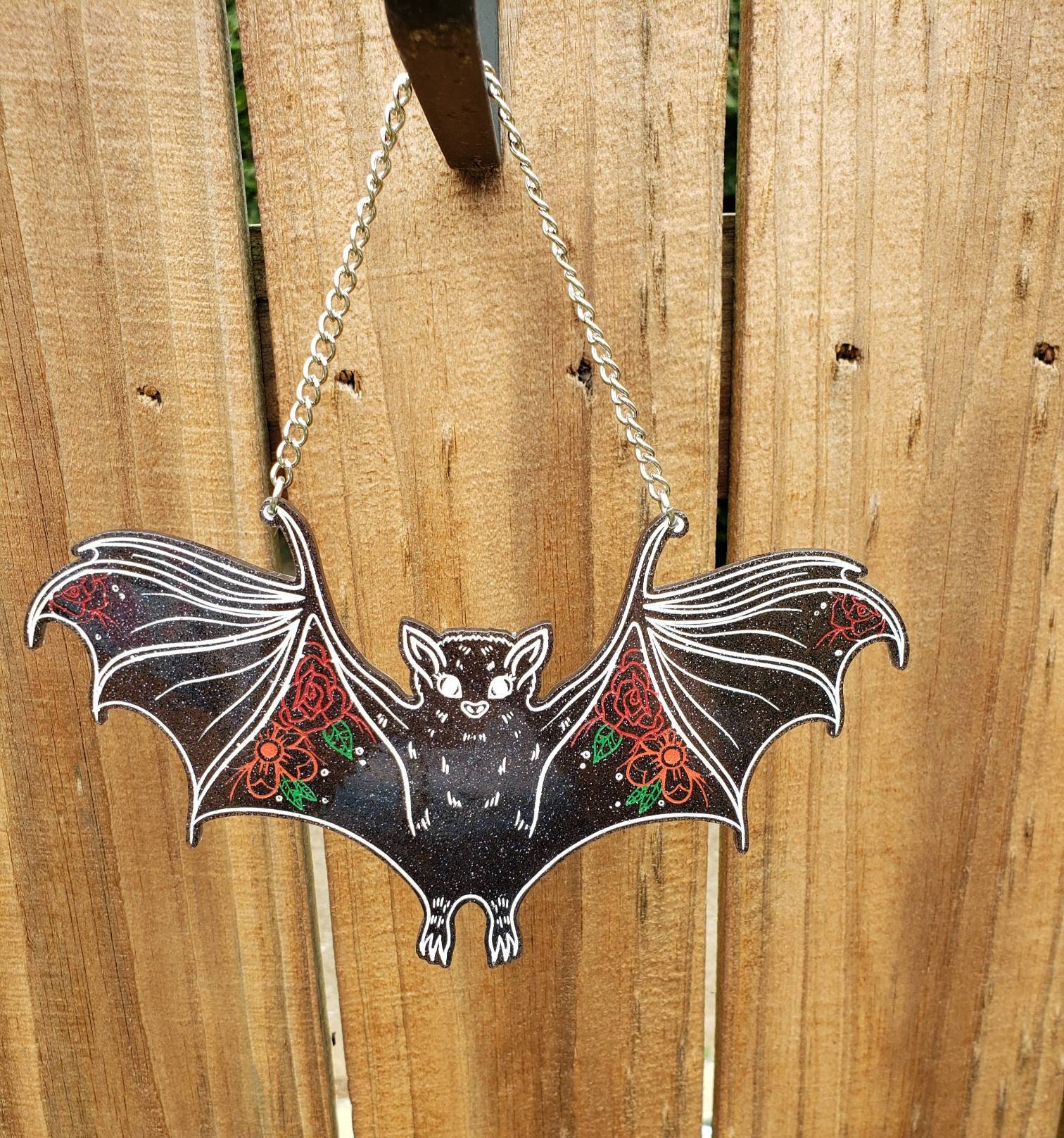 Resin hanging bat with flowers | Etsy