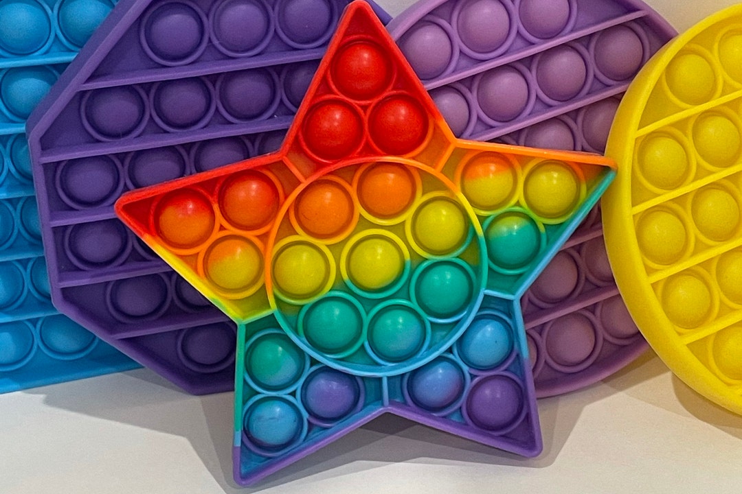 Pop It’s in All Different Colours and Shapes Such as Squares ,stars ...