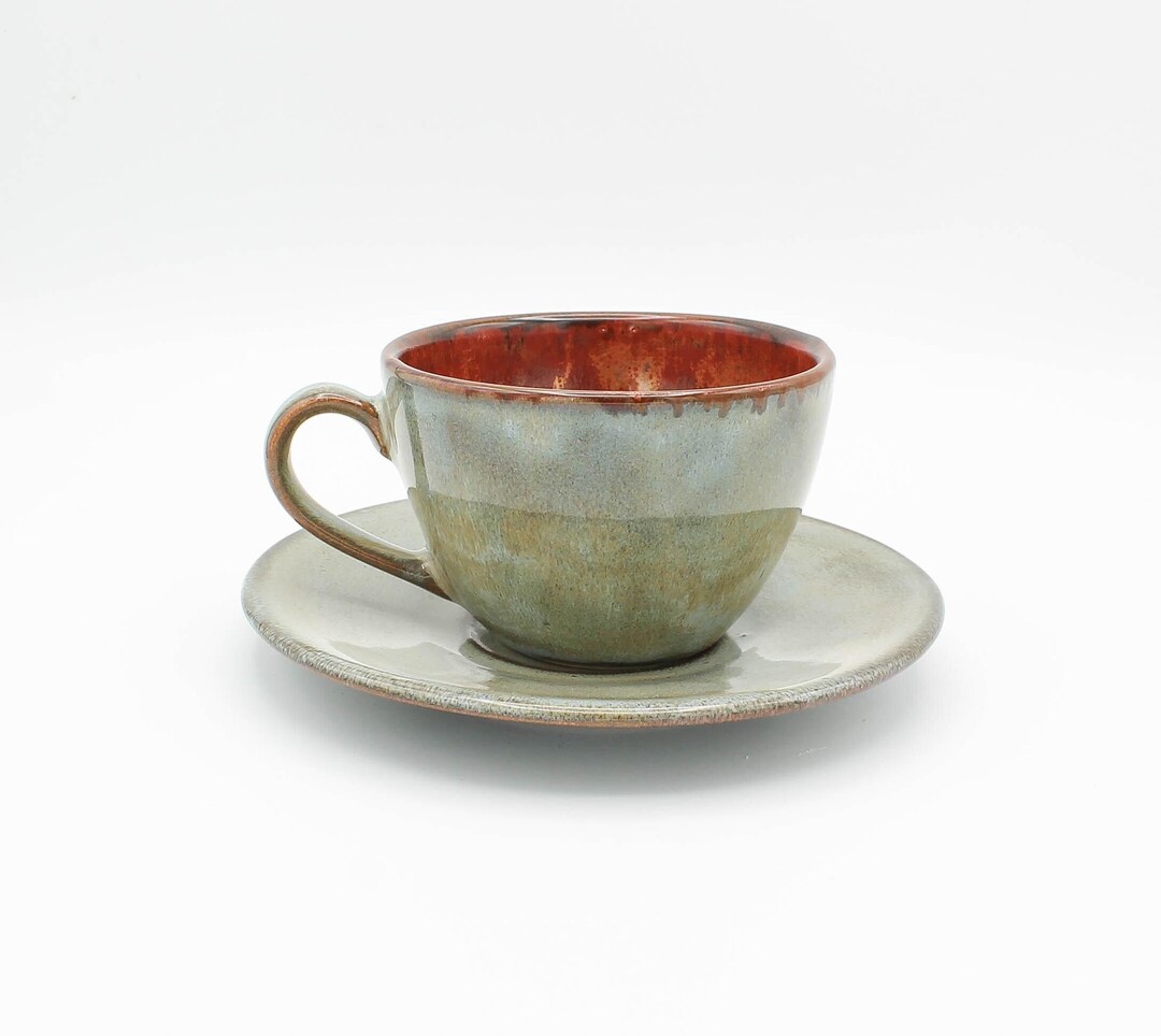 A Handmade, Small Pottery Coffee Cup and Saucer With Layered Blue ...
