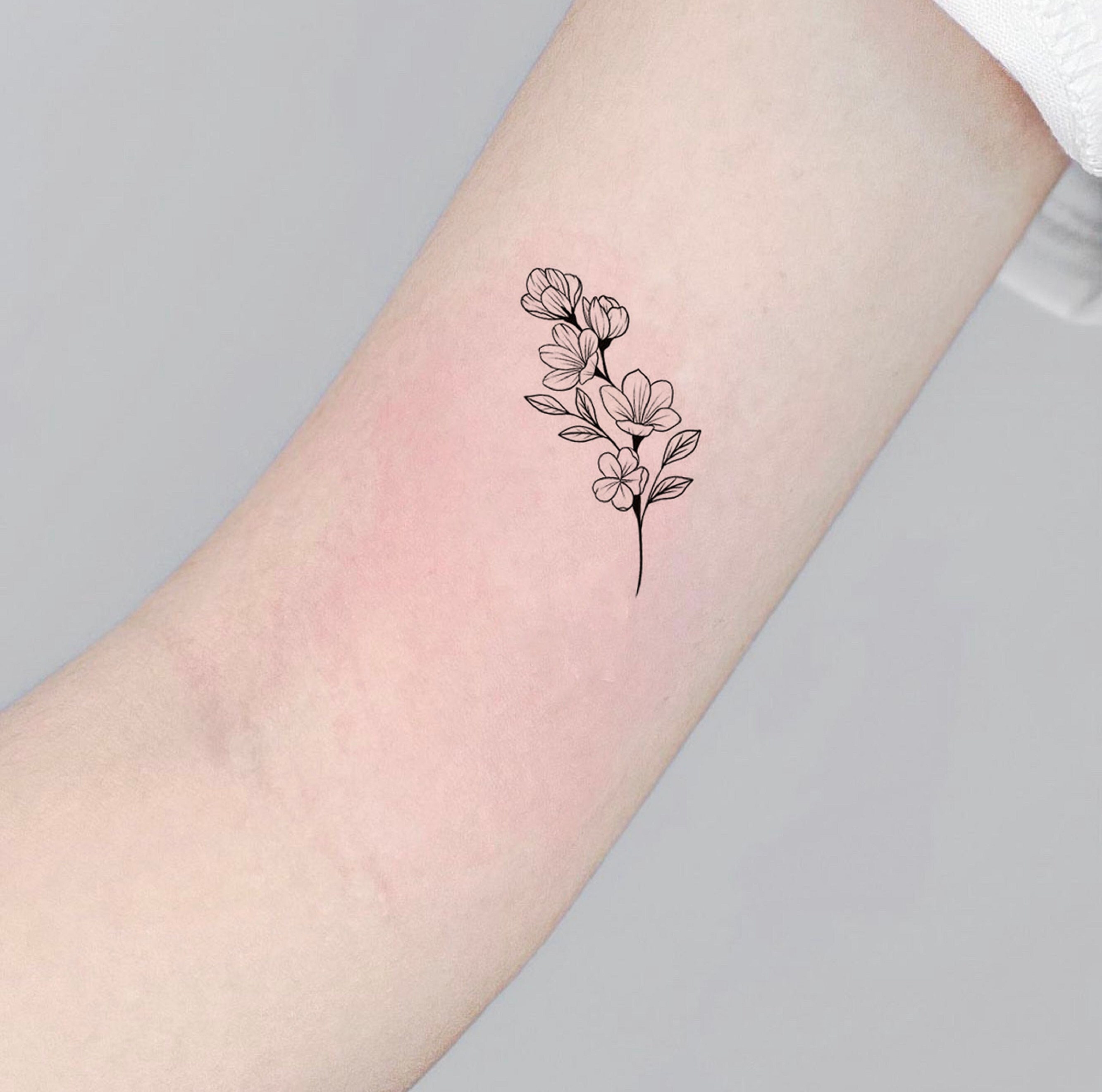 Black Plumeria Flower Tattoo