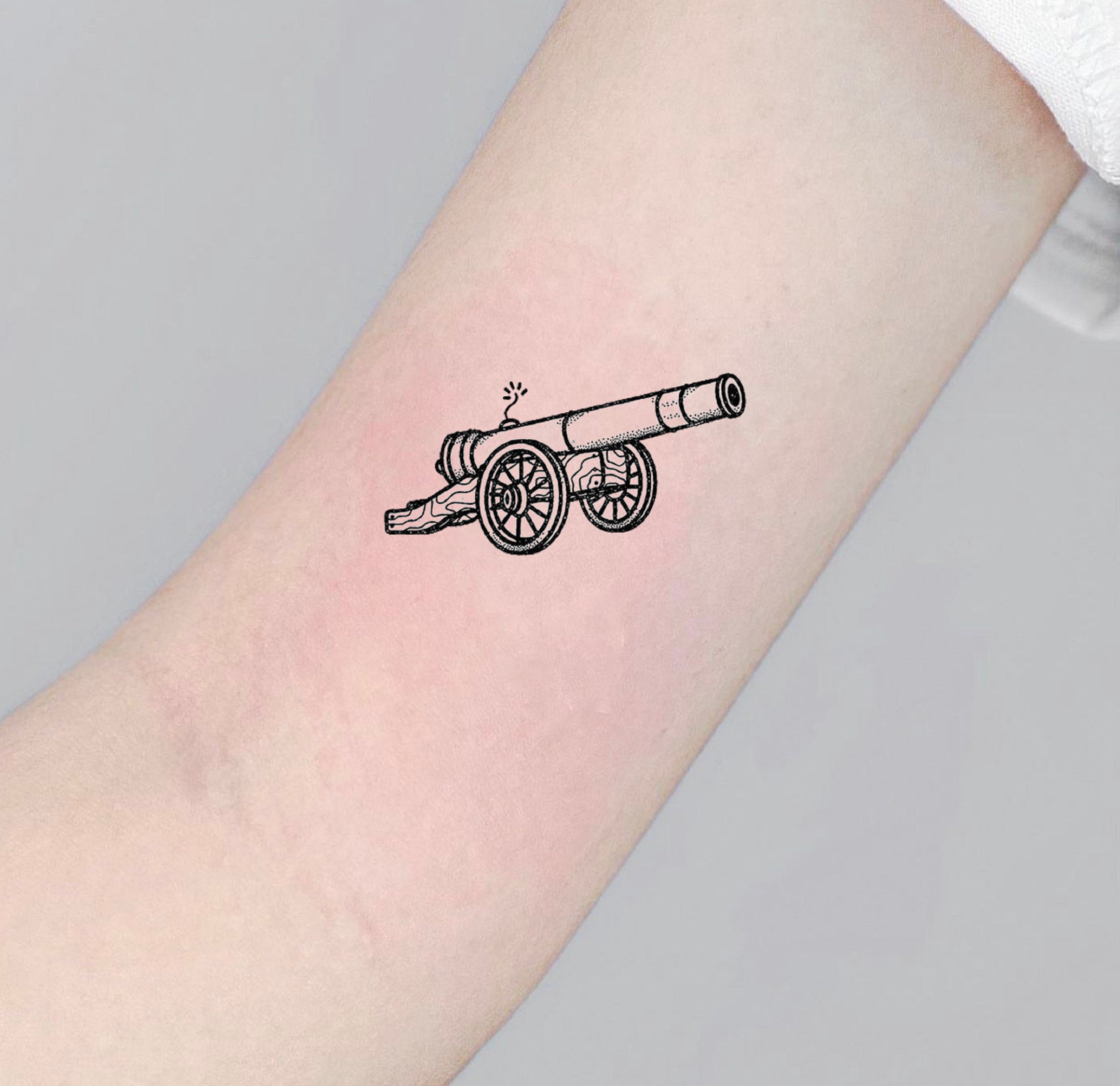 Cross Cannons Tattoo