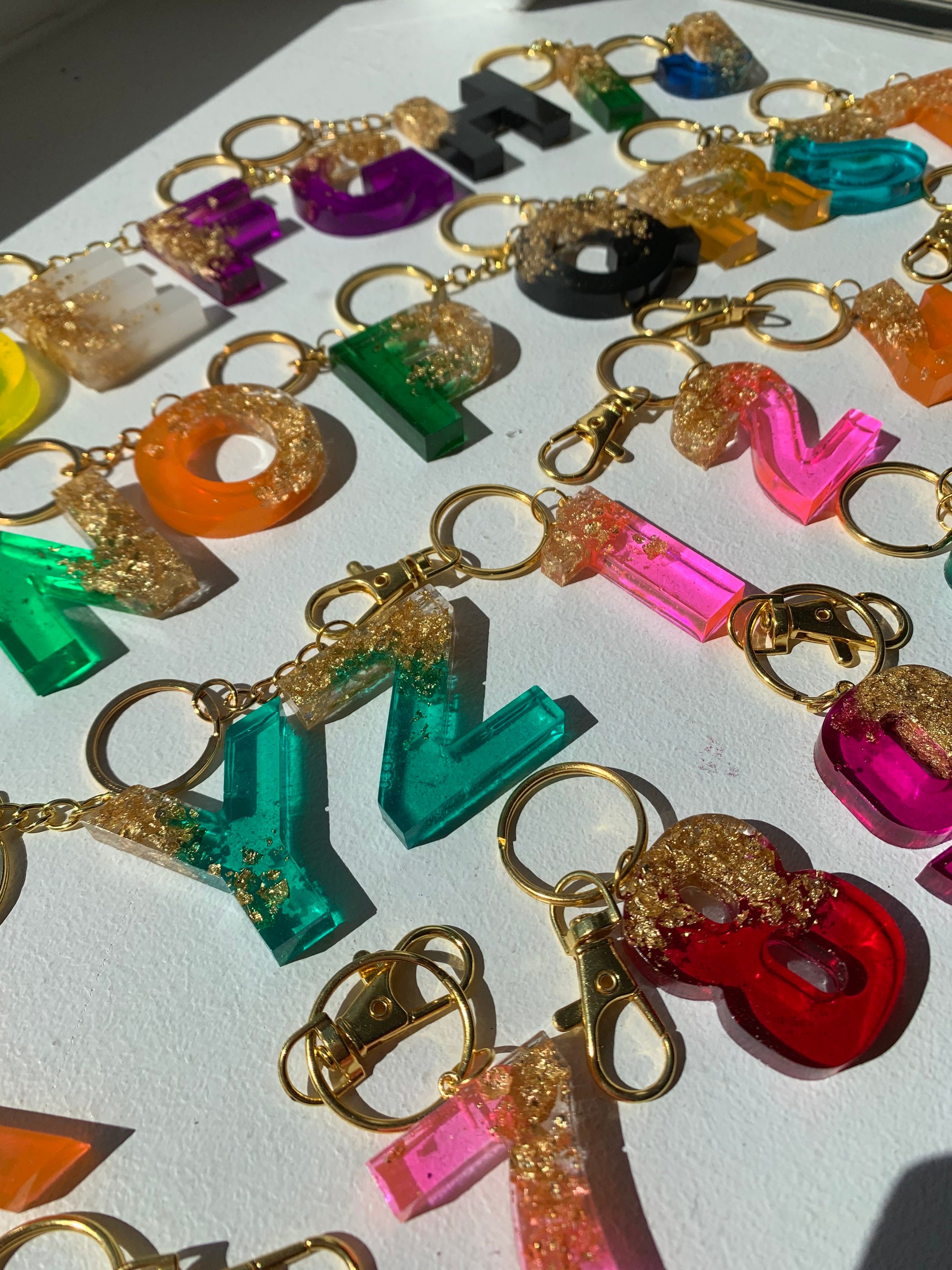 Keyrings figures letters in resin with gold leaves and colors. | Etsy