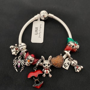 Linx Bracelet With Skull Scary Clown and Voodoo Doll Themed Charms - Etsy