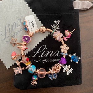 Linx Rose Gold Snake Chain Bracelet With Beach and Summer Themed Charms ...