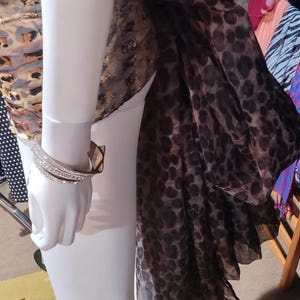 You'll Dazzle in This Gold and Black Leopard Themed Cher Costume, With ...