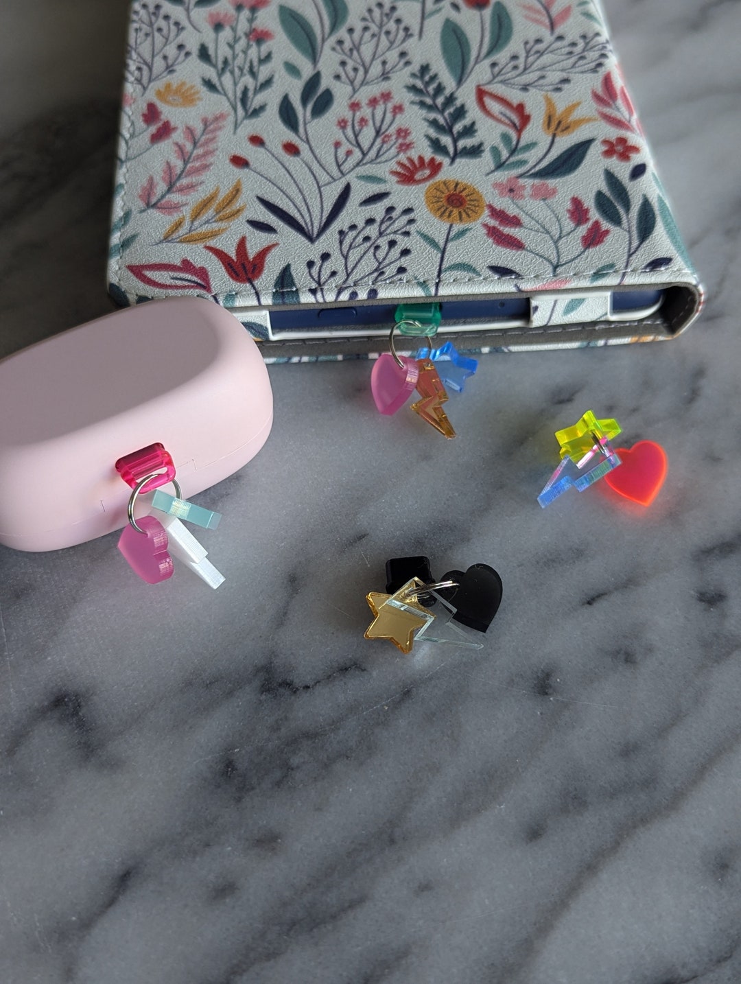 Kindle Charm. USB-C Dust Plug. Kindle Accessories. Book Club. Air Pods ...