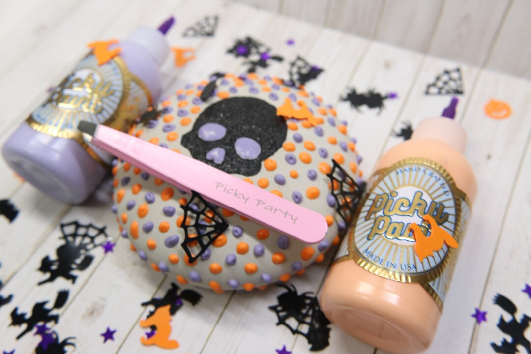 Skull Head Engraved on a Smooth Finger Picking Stone Kit (tweezer ...