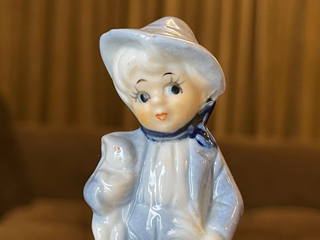 Porcelain Little Boy Figurine the Boy is Happy to Have a Bunny in His ...