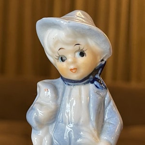 Porcelain Little Boy Figurine the Boy is Happy to Have a Bunny in His ...