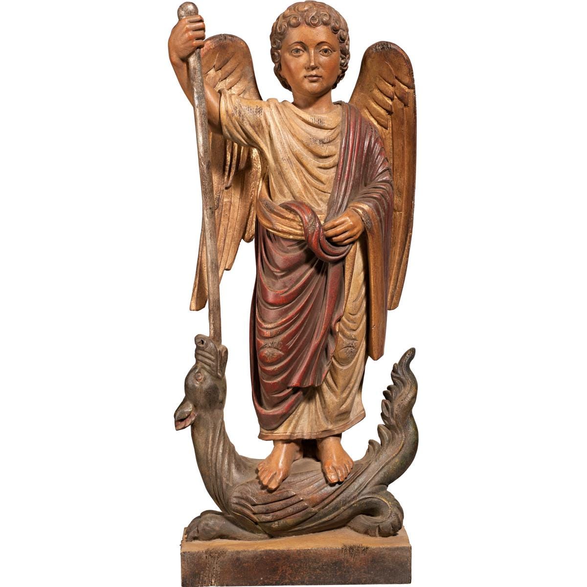 Romanesque statue of Saint Michael the Archangel, carved from ...
