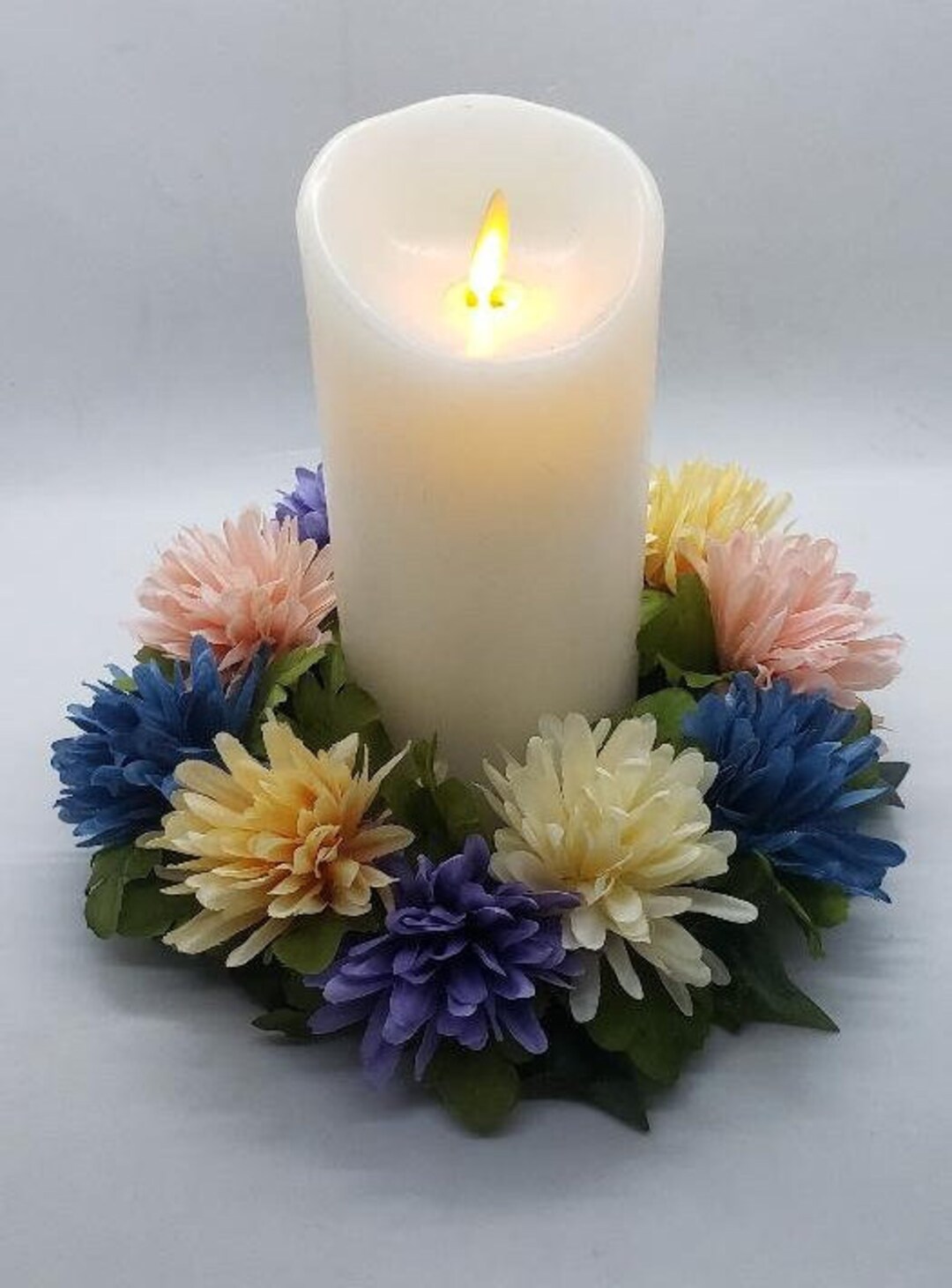 Candle Ring Floral Centerpiece With Mixed Pastel Mums Theme. Candle ...