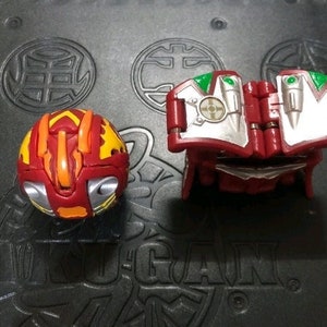 Bakugan Pyrus Lumino Dragonoid & Explosix Cross Buster Battle Gear ...