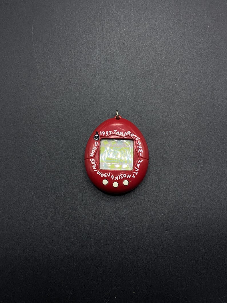SKU B140P856TA | Tamagotchi Red First Generation Authentic Toy Bandai ...