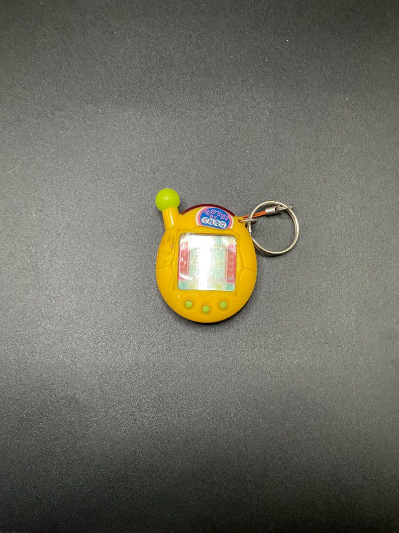 SKU B57P463 | Tamagotchi V4 Connection Yellow Japanese Version ...
