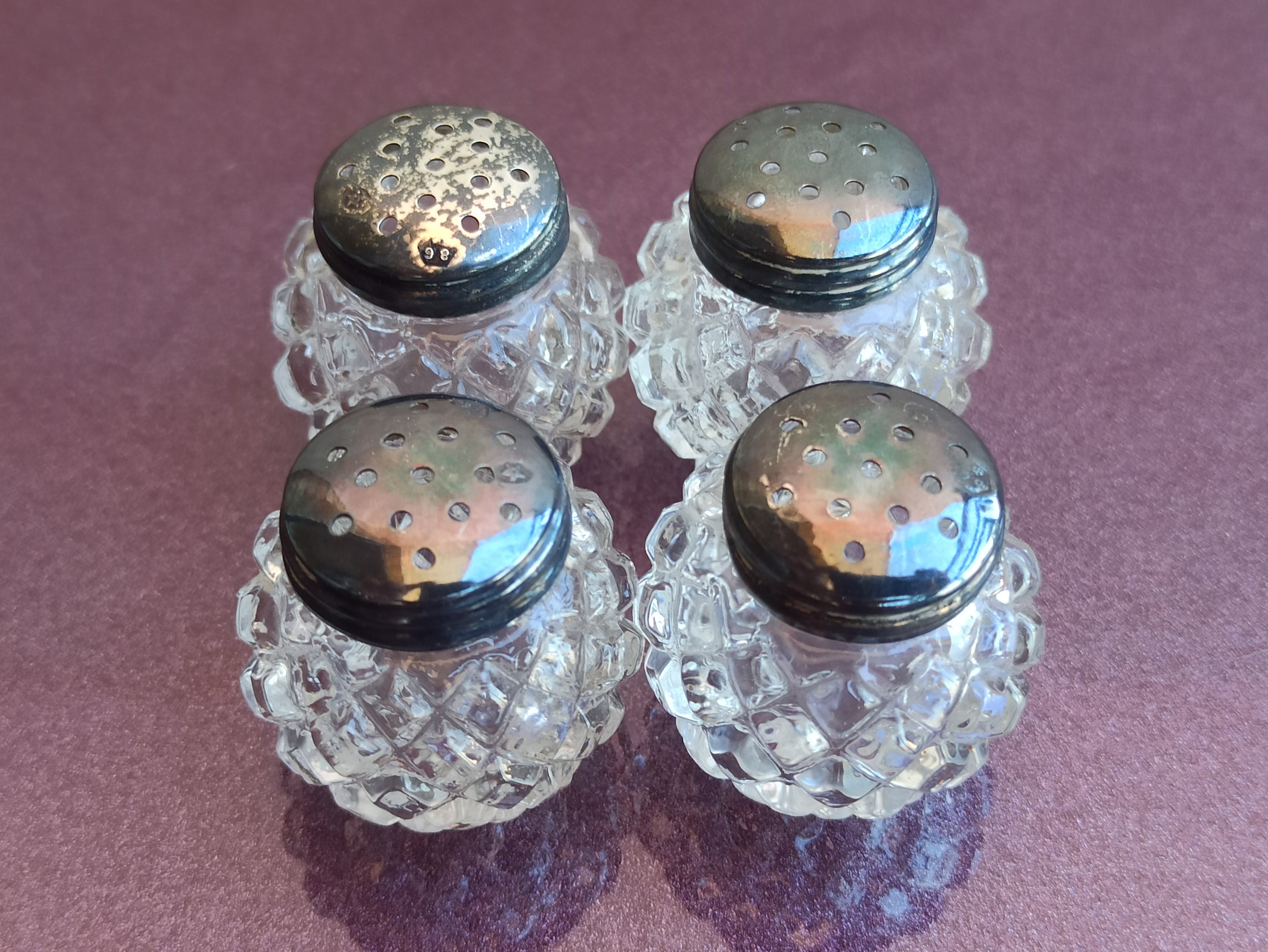 Salt and pepper shakers with lids store