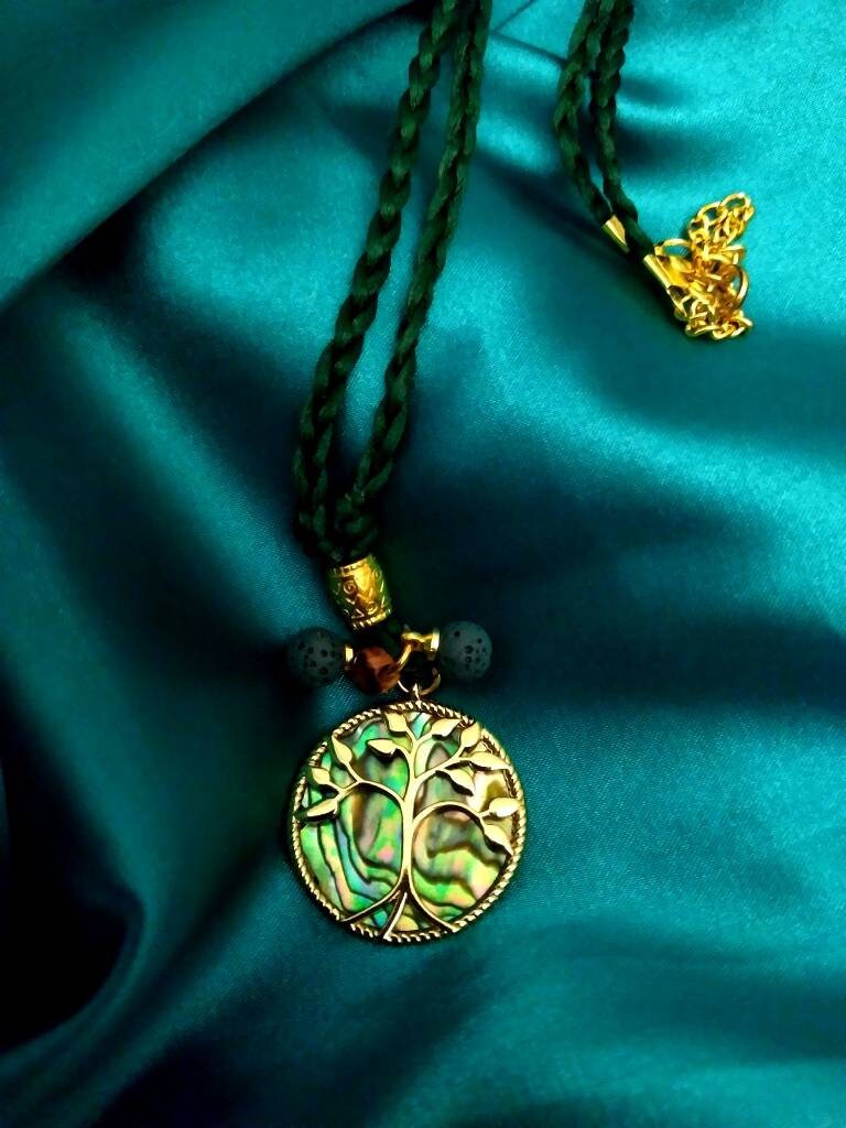 The Gold Tree of Life Pendant is on a Beautiful Multi-color Iridescent ...