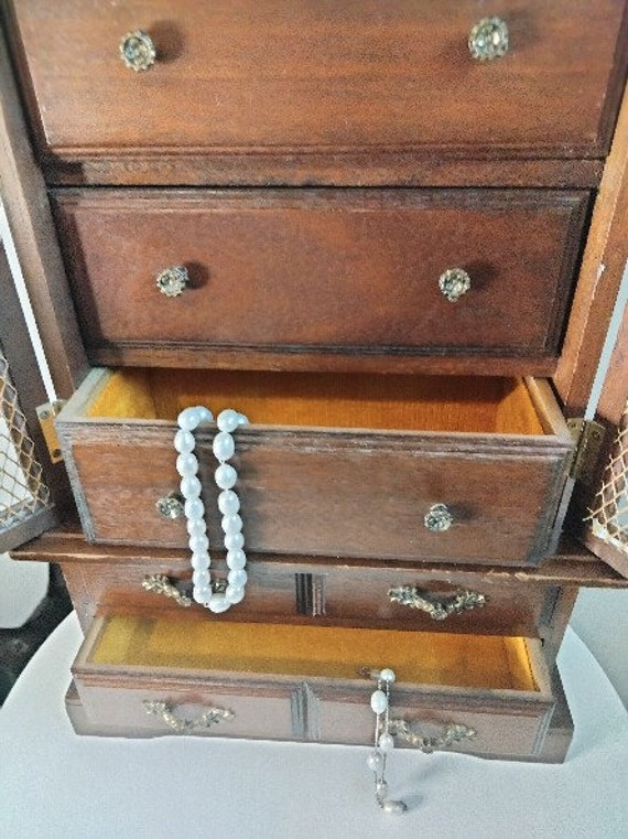 Musical Hutch cabinet design with yellow velvet lined… - Gem