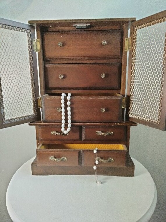 Musical Hutch cabinet design with yellow velvet lined… - Gem
